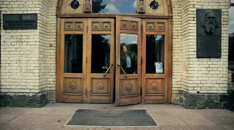 Happy students coming out of the univers... | Stock Video | Pond5