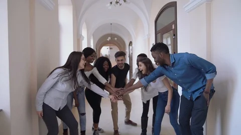 Happy students showing unity joining han... | Stock Video | Pond5