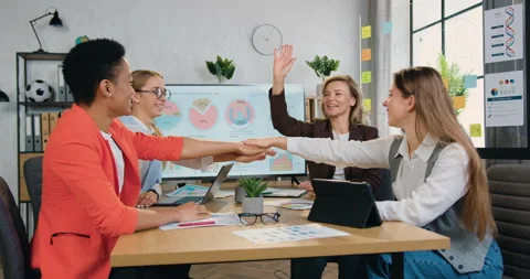 Happy successful female team celebrate g... | Stock Video | Pond5