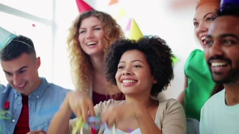 happy team throwing confetti at office p... | Stock Video | Pond5
