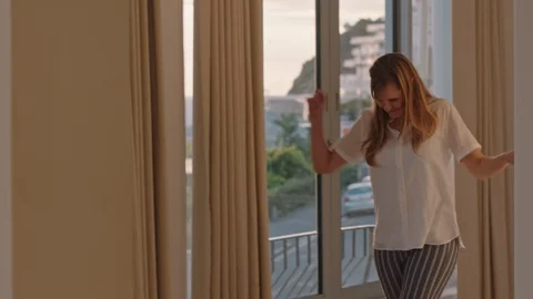 happy travel woman dancing in hotel room... | Stock Video | Pond5