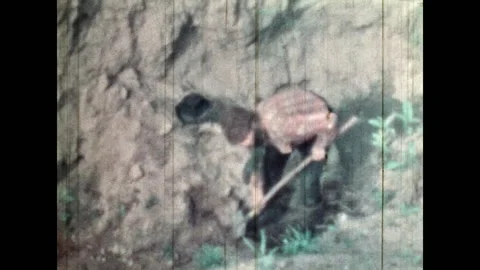 Happy treasure hunter digging ground in ... | Stock Video | Pond5