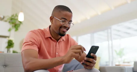 Happy, typing and a black man with a pho... | Stock Video | Pond5