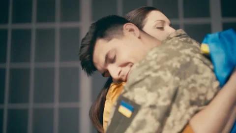 Happy Ukrainian couple hugging, military... | Stock Video | Pond5