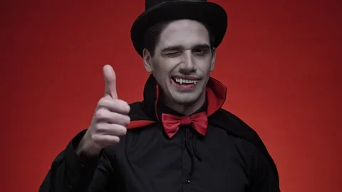 Happy vampire man in black halloween cos... | Stock Video | Pond5