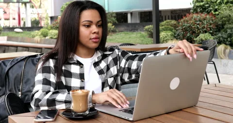 Happy woman completing her work and clos... | Stock Video | Pond5