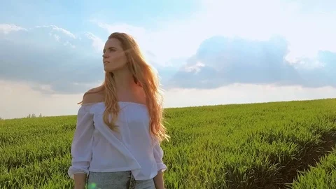 Happy woman with long hair running on su... | Stock Video | Pond5