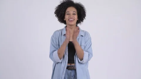 Happy young beautiful African woman clap... | Stock Video | Pond5
