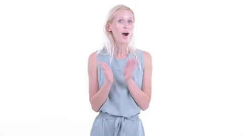 Happy young beautiful blonde woman clapp... | Stock Video | Pond5