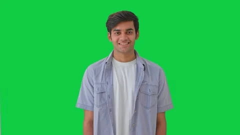 Happy young Indian boy smiling Green scr... | Stock Video | Pond5