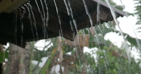Hard rain falling and flowing down close... | Stock Video | Pond5