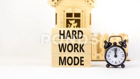 Hard work mode symbol. Concept words Hard work mode on wooden block on ...