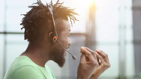 He is always ready to help a young black... | Stock Video | Pond5