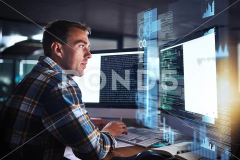 He puts the pro in programmer. a young programmer working at his ...