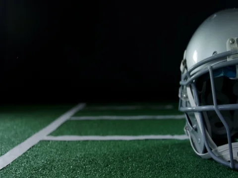 Head gear on artificial turf 4k | Stock Video | Pond5