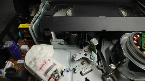The head of an old VHS VCR with a VHS ca... | Stock Video | Pond5
