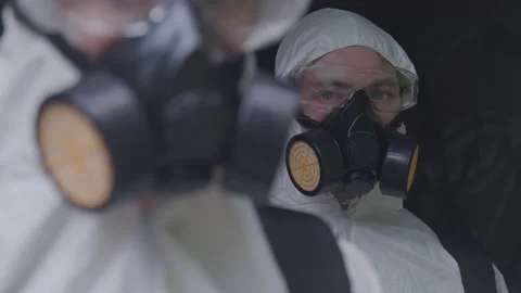 Headshot of Workers in Full Hazmat Suits... | Stock Video | Pond5