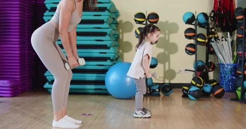 Healthy lifestyle. Mom and daughter are ... | Stock Video | Pond5