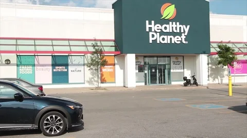 healthy planet store front entrance with... | Stock Video | Pond5