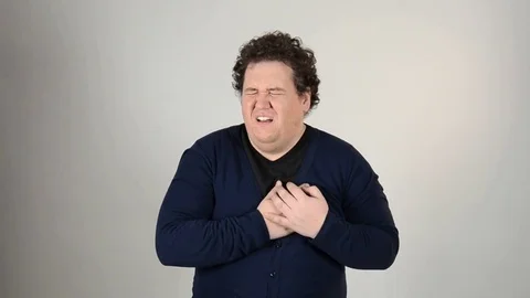 Fat Man Chest Pain Stock Footage ~ Royalty Free Stock Videos | Pond5