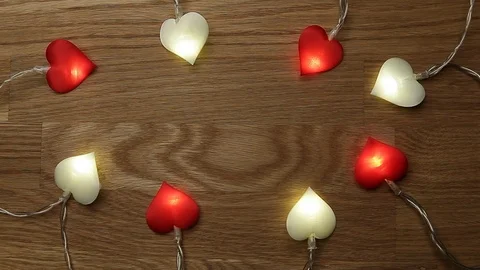 heart garland wooden desk background hd ... | Stock Video | Pond5