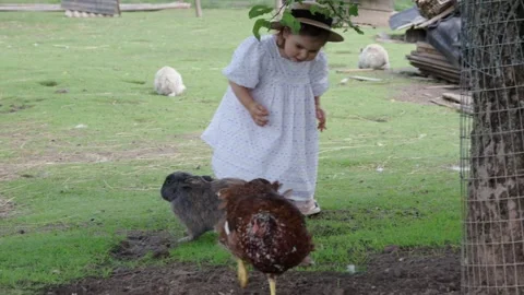 Heartwarming video of a little girl bond... | Stock Video | Pond5