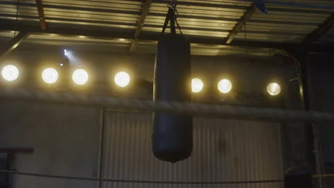 Heavy Bag Hanging From Behind Blurred Bo... | Stock Video | Pond5