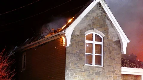 Heavy damage on roof level of luxury hou... | Stock Video | Pond5