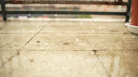Heavy hail falling down to ground with r... | Stock Video | Pond5