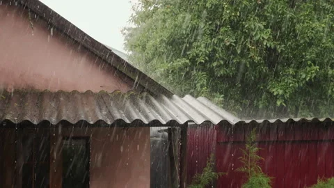 Heavy pouring rain with hail hits the ro... | Stock Video | Pond5