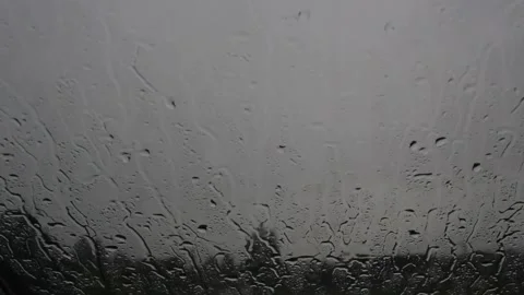 Heavy rain on the window - heavy rain on... | Stock Video | Pond5