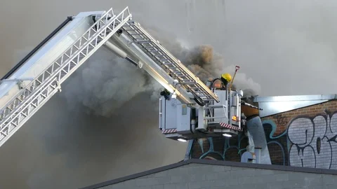 Heavy smoke pouring out of building's co... | Stock Video | Pond5