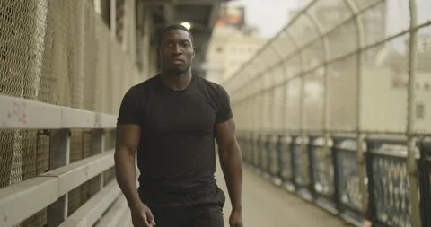 A heavyweight boxer walking in the stree... | Stock Video | Pond5