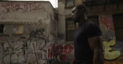 A heavyweight boxer walking in the stree... | Stock Video | Pond5