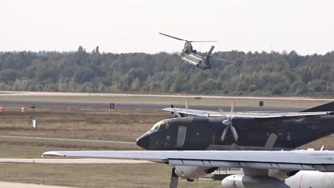 Helicopter and Airplane Action at Milita... | Stock Video | Pond5
