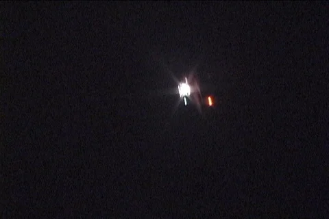 Helicopter Overhead with Spotlight at Ni... | Stock Video | Pond5