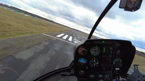 Helicopter turning vacating runway flyin... | Stock Video | Pond5