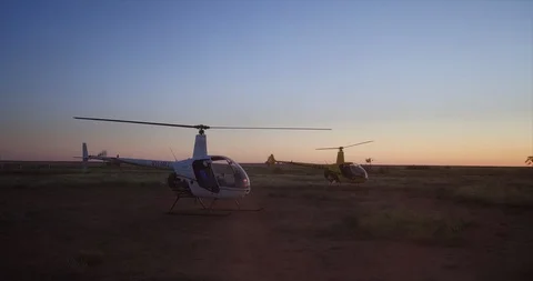Helicopters taking off in Australian out... | Stock Video | Pond5