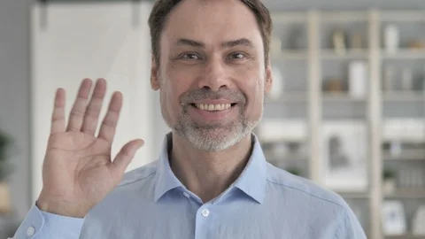 Hello, Senior Aged Businessman Waving Ha... | Stock Video | Pond5