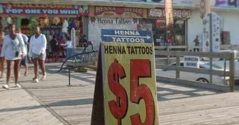 Henna Tattoos $5 on Beach Boardwalk | Stock Video | Pond5