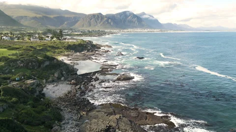 Hermanus coastal rocky cliffs, blue ocea... | Stock Video | Pond5