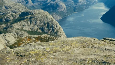 Hero pose atop of Pulpit Rock, zoom pull... | Stock Video | Pond5