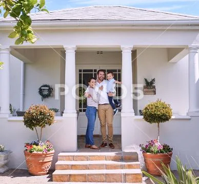 Hes a chip off the old block. Shot of a family standing together on the ...