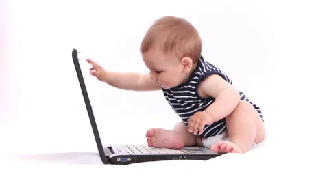 Hi Tech Baby. Boy playing with a laptop ... | Stock Video | Pond5