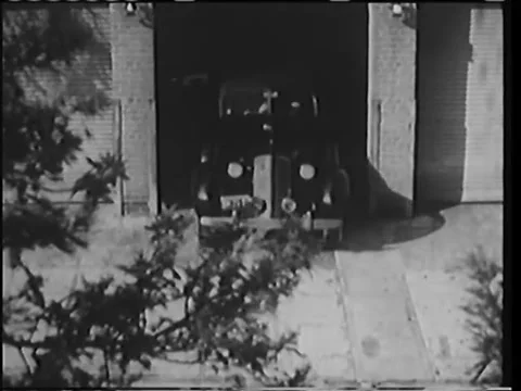 High angle shot of car driving out of ga... | Stock Video | Pond5