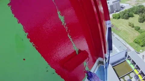 High rise abseiled apply paint on an ind... | Stock Video | Pond5