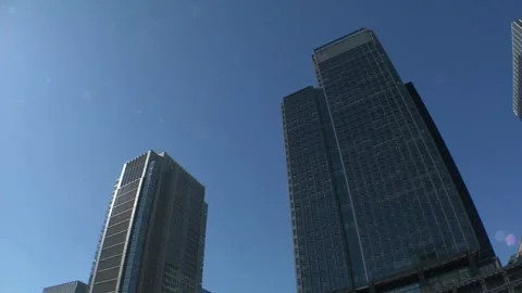 High-rise buildings in Marunouchi, Tokyo... | Stock Video | Pond5