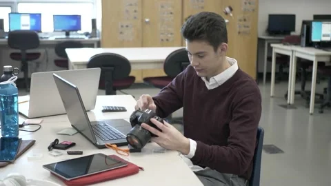 High school boy student using SLR camera... | Stock Video | Pond5