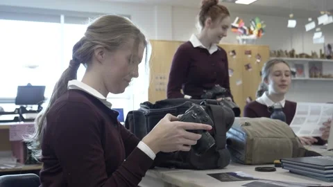 High school girl student using SLR camer... | Stock Video | Pond5