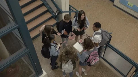 High school students looking at voting p... | Stock Video | Pond5